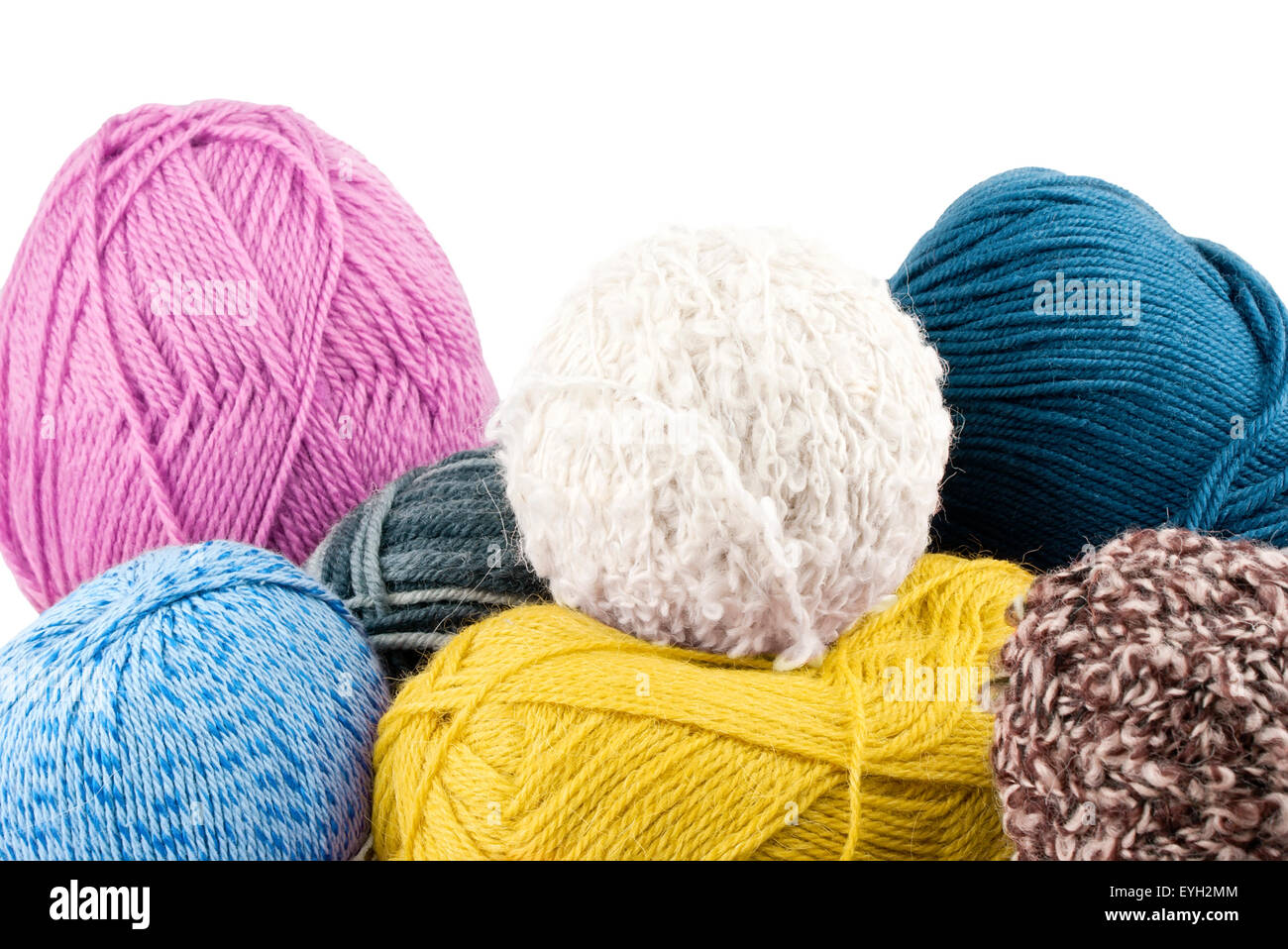 Balls of yarn on white background Stock Photo - Alamy