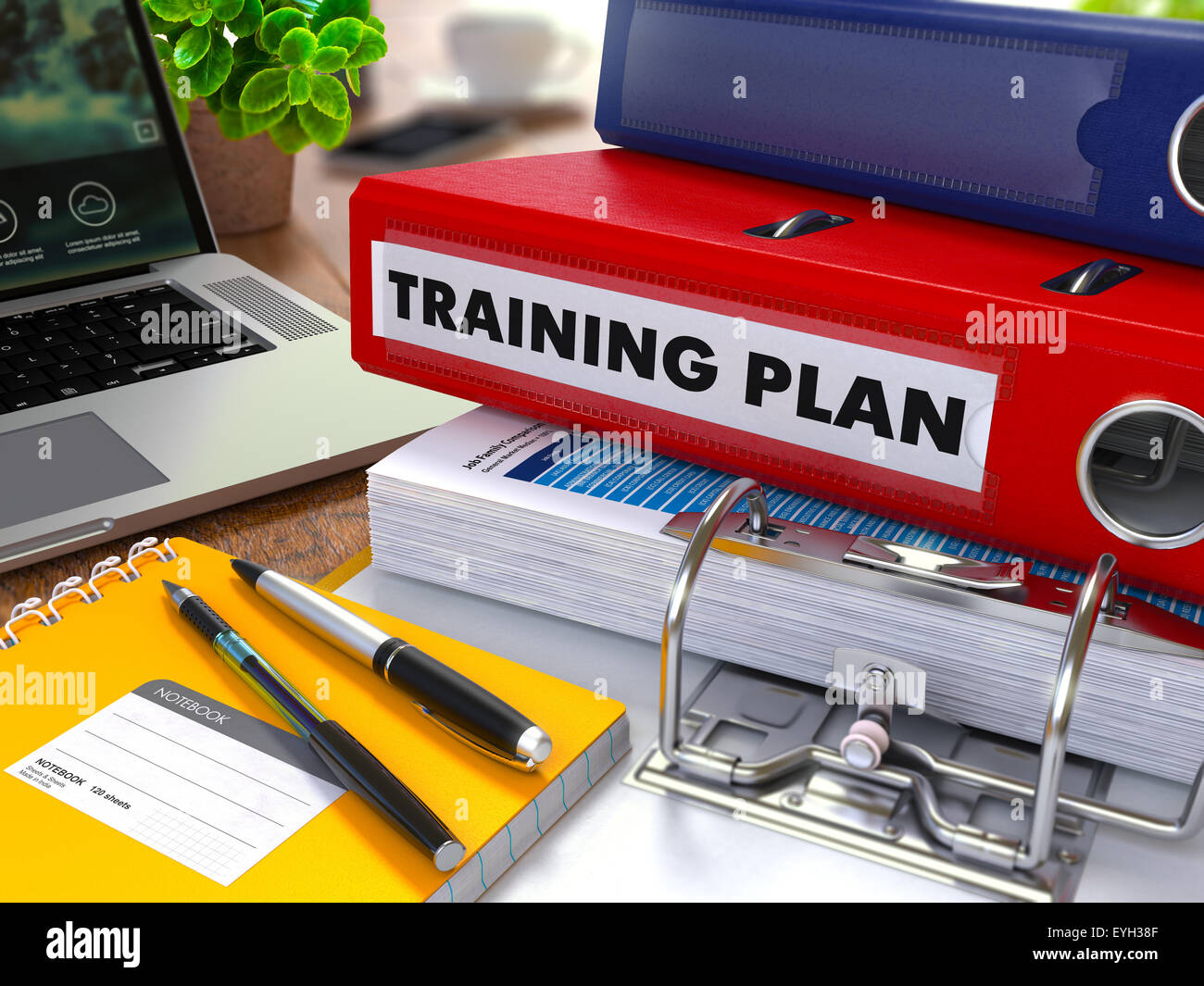 Red Ring Binder with Inscription Training Plan Stock Photo - Alamy