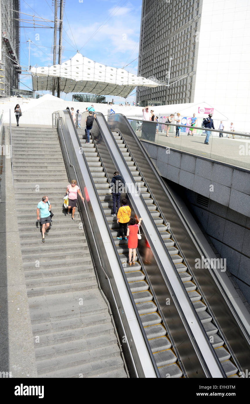 Escalators down into the Paris Metro at the Grande Arch de la Defense ...