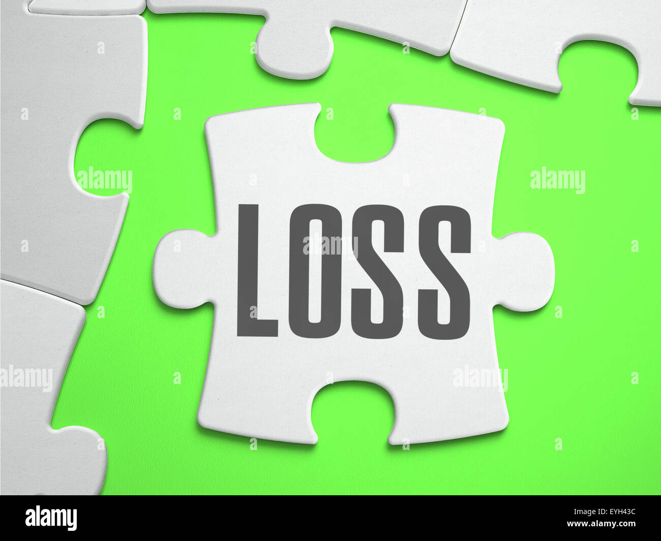 Loss - Jigsaw Puzzle with Missing Pieces Stock Photo - Alamy