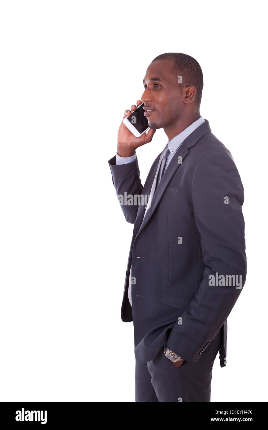 Portrait of a young African American business man making a mobile phone ...