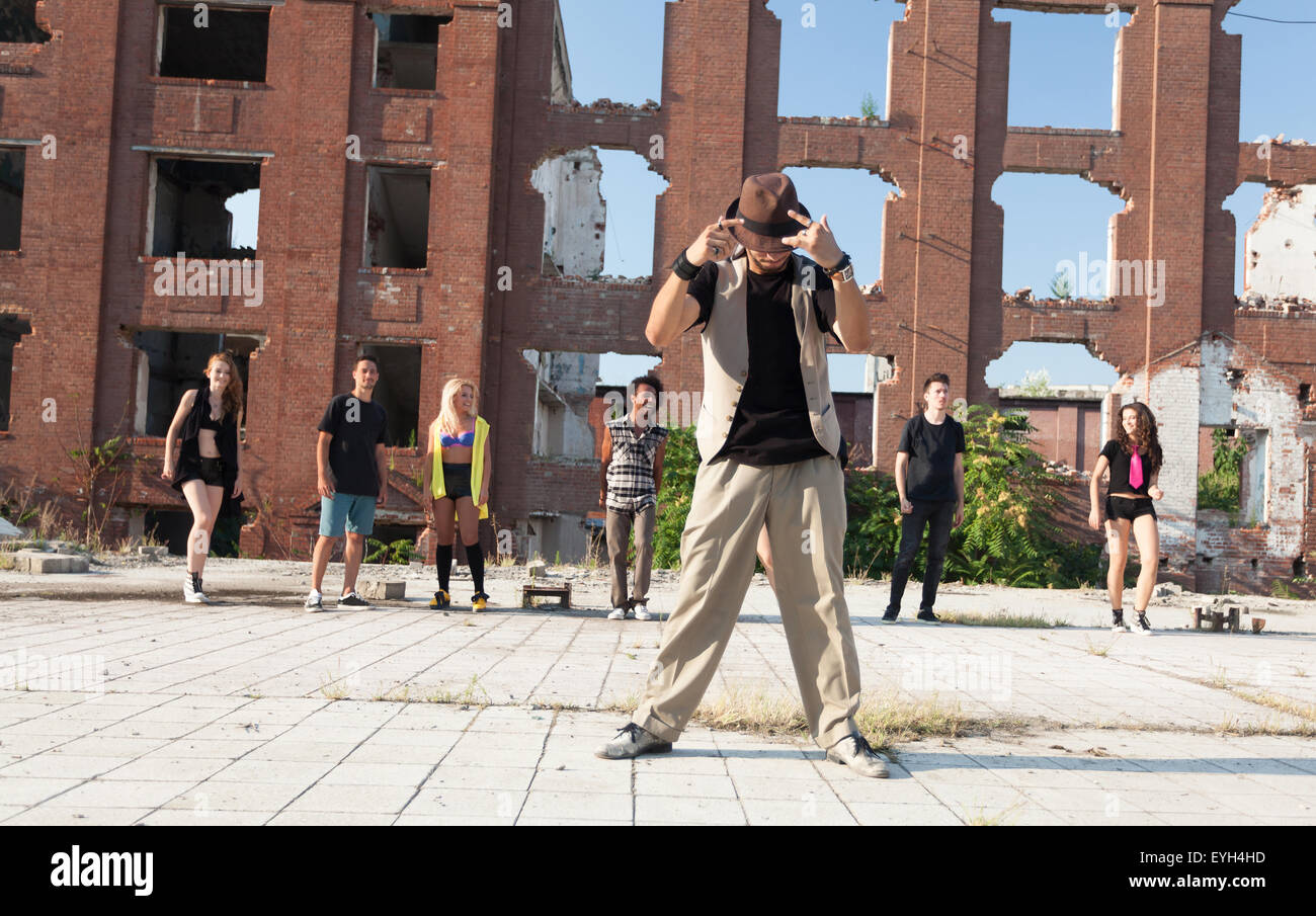 Energetic young hip hop street dancer performing his routine in an ...