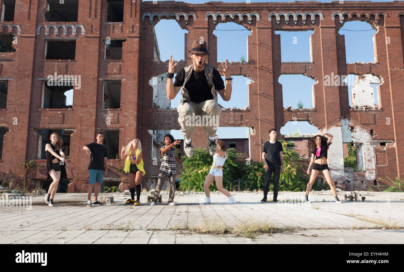 Energetic young hip hop street dancer performing his routine in an ...