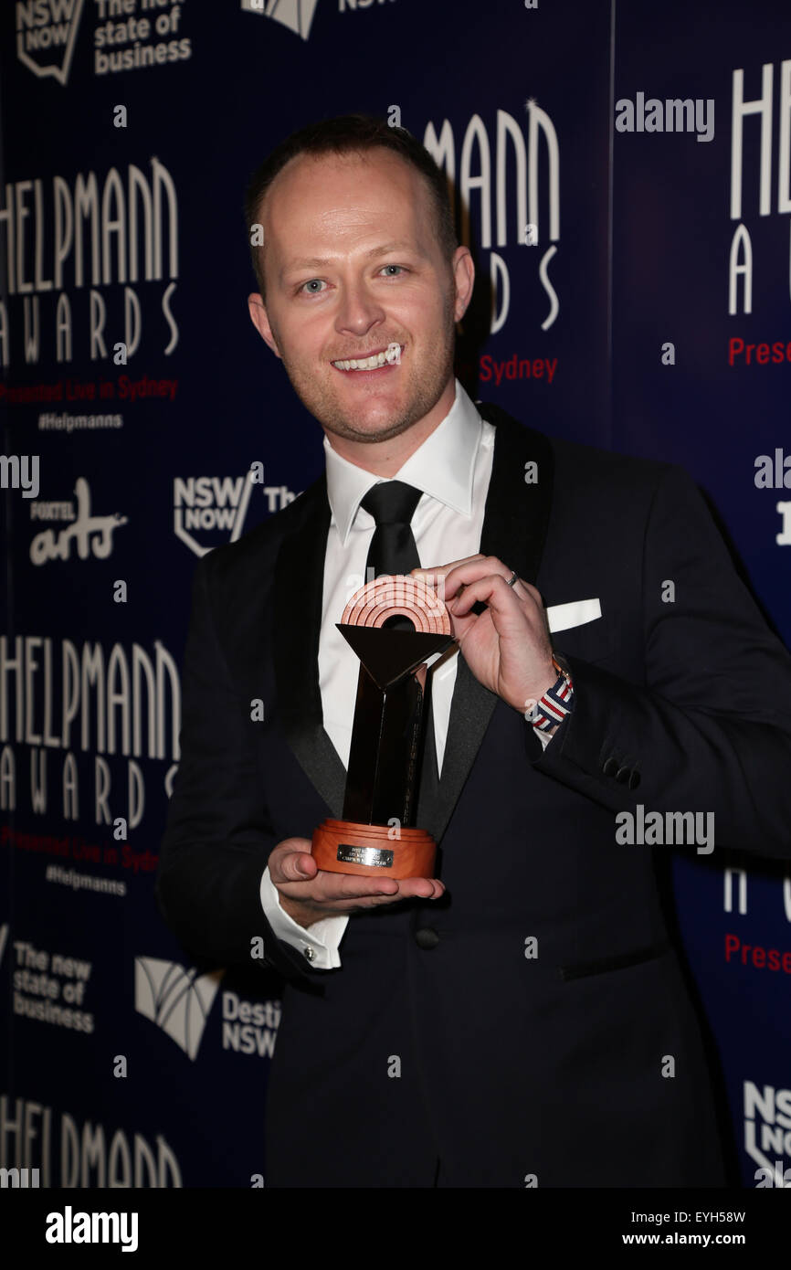 Michael Cassel poses with the award for Best Musical at the Helpmann ...