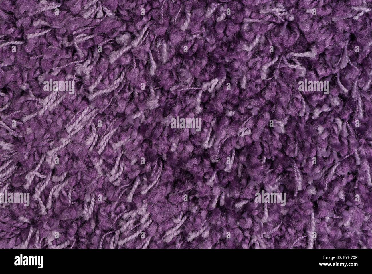 Closeup detail of purple carpet texture background Stock Photo - Alamy