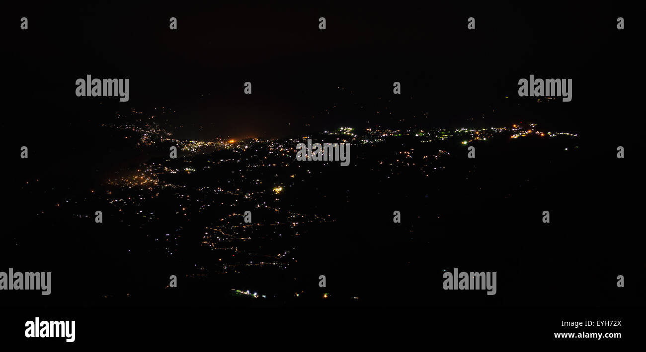 View of Kalimpong City of Himalayan hills during night with copy space ...