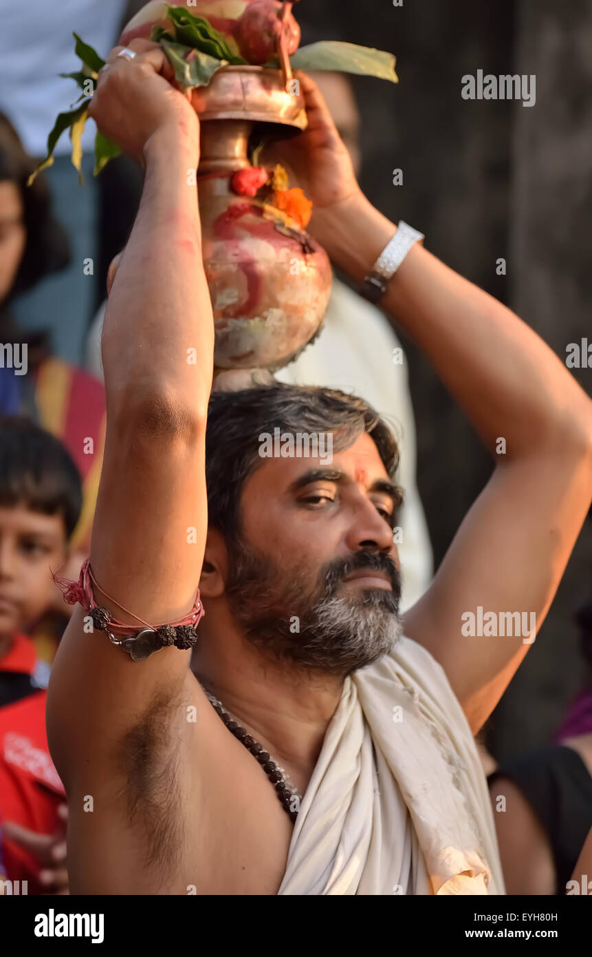 The hindu man refresh himself in last day called "Dashami" Durga Puja ...