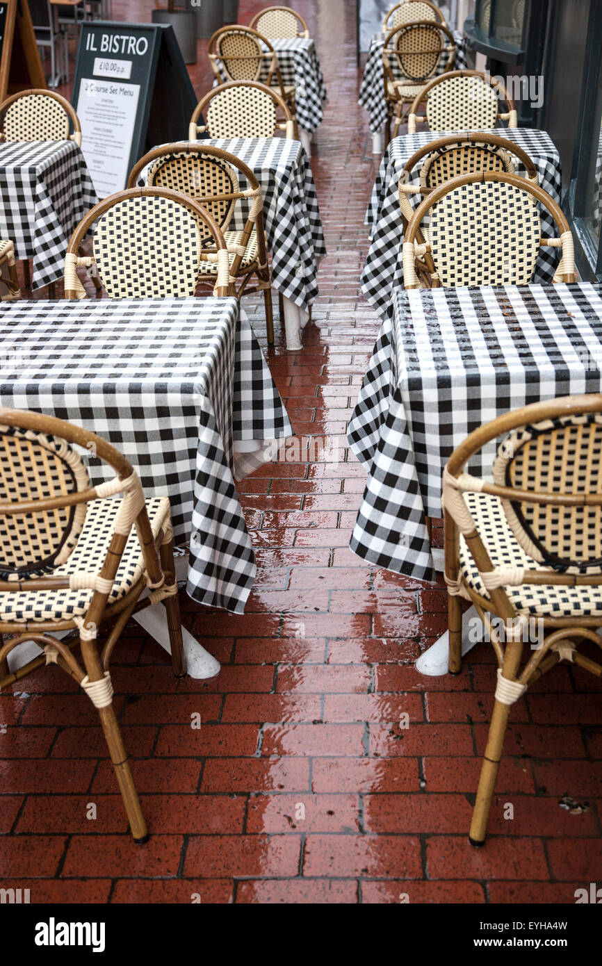 Rain on outside outdoors Summer restaurant tables Stock Photo - Alamy
