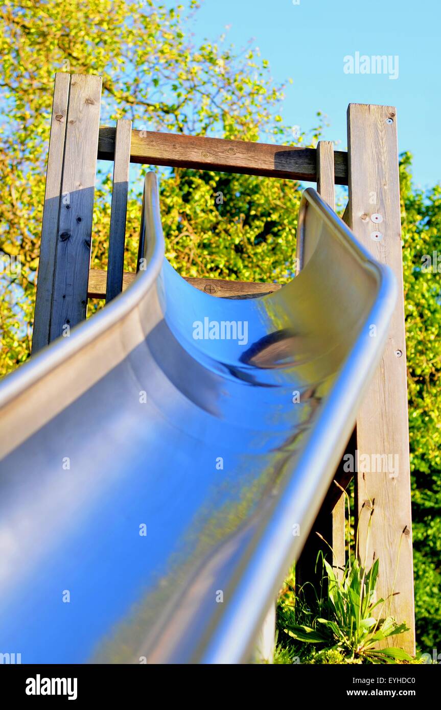 Detail of a slide at the playground Stock Photo - Alamy