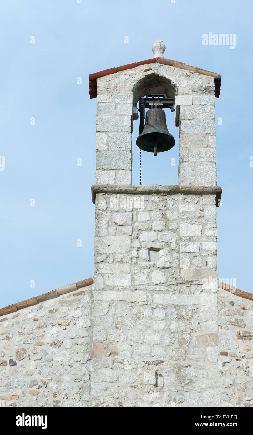 Small bell tower with a bell of a country church in the 13th century ...