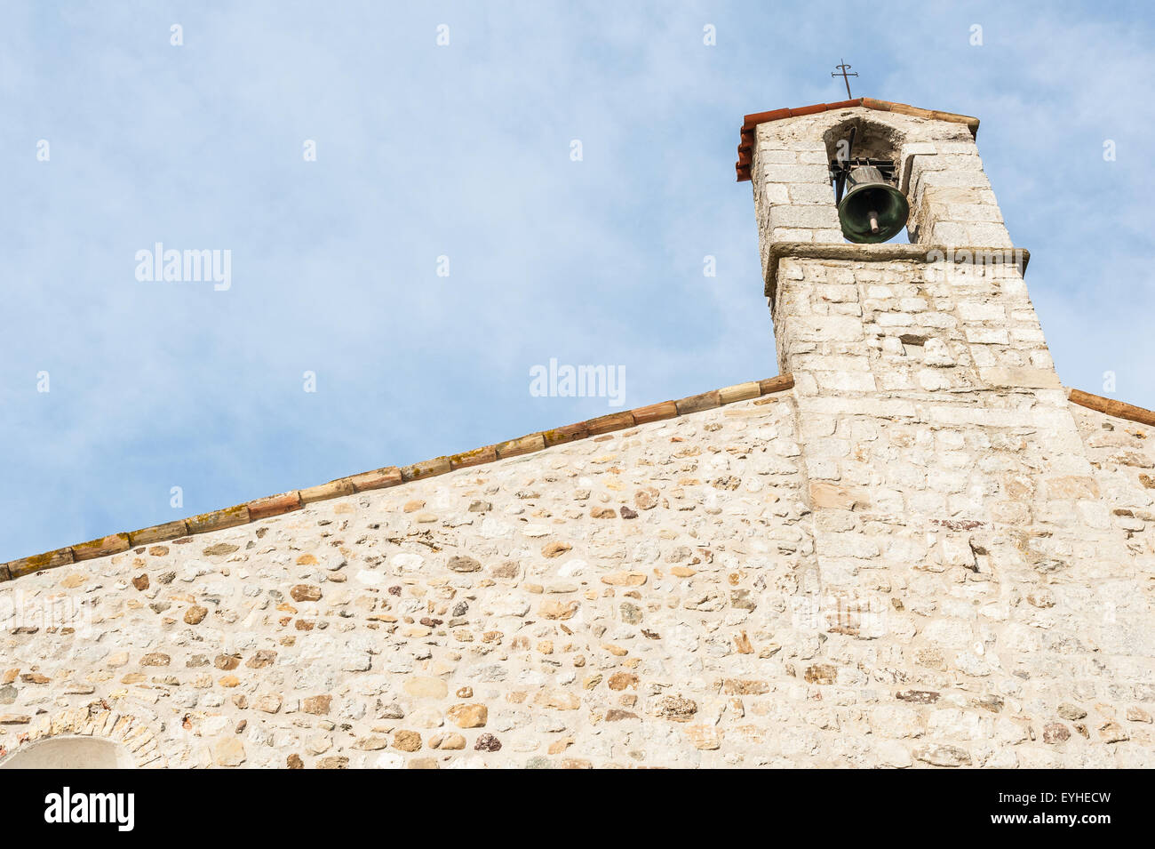 Small bell tower with a bell of a country church in the 13th century ...