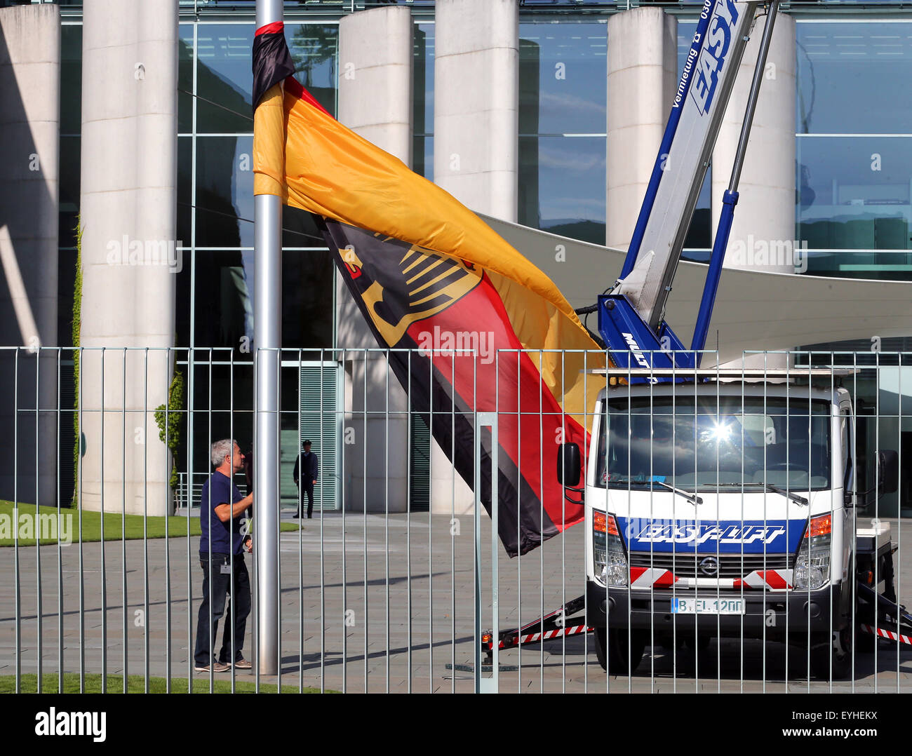 Germany flag worker hi-res stock photography and images - Alamy