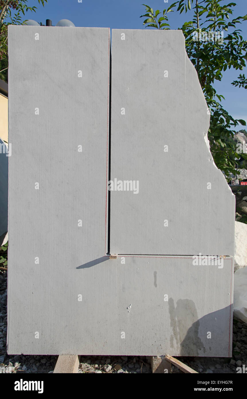 Block of marble of Carrara divided into two Stock Photo - Alamy
