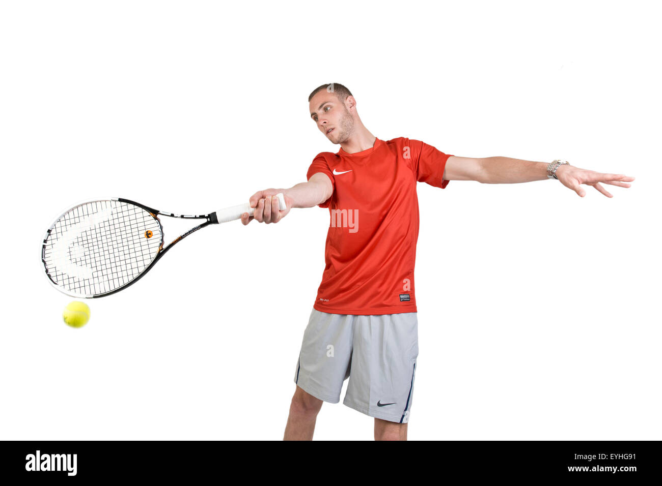 Young man playing tennis Stock Photo - Alamy