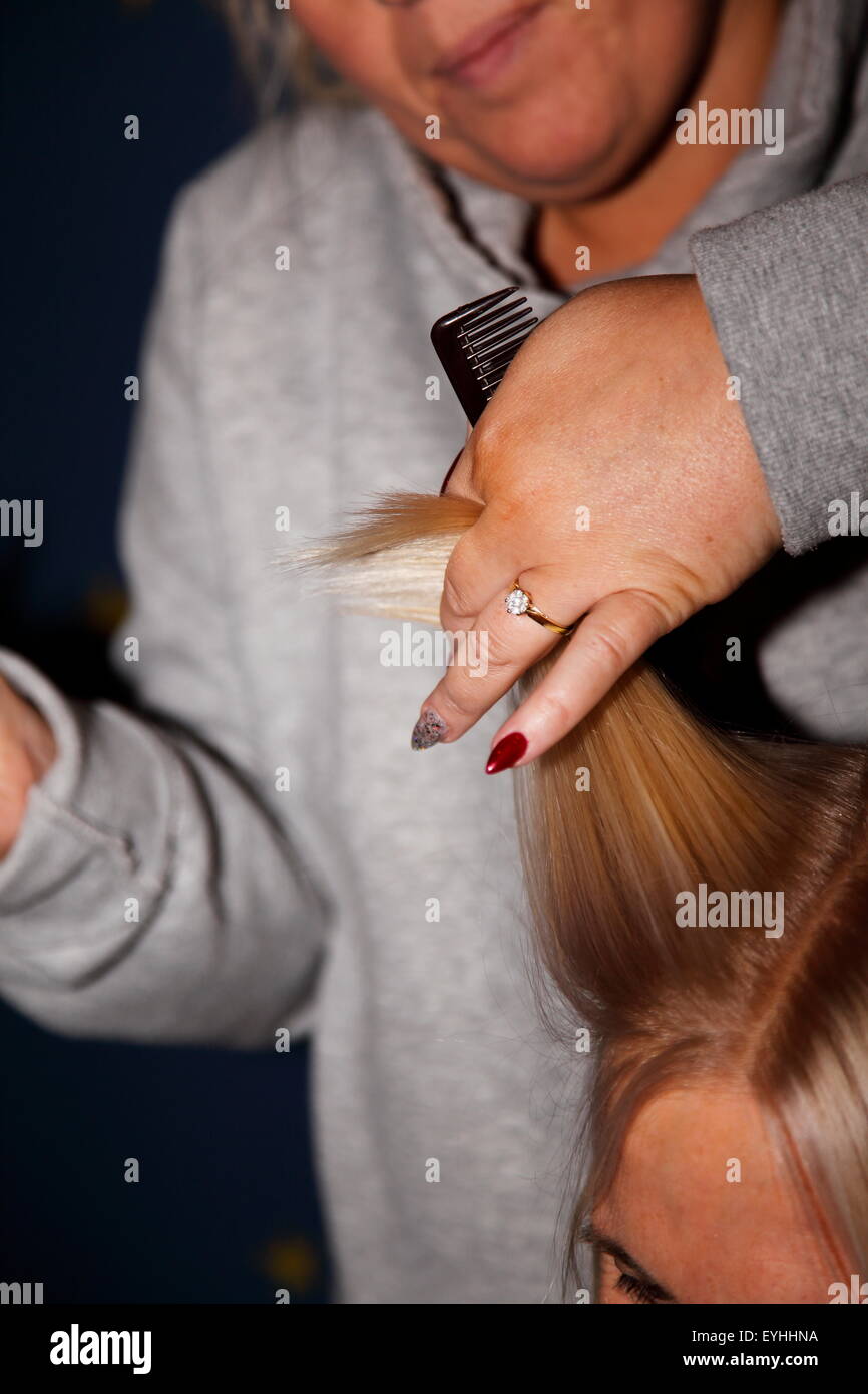Receiving a haircut hi-res stock photography and images - Alamy