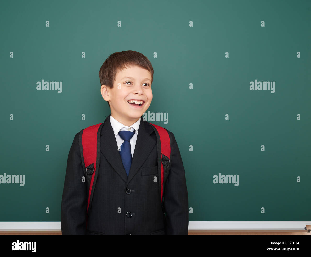 school boy portrait on board background Stock Photo - Alamy