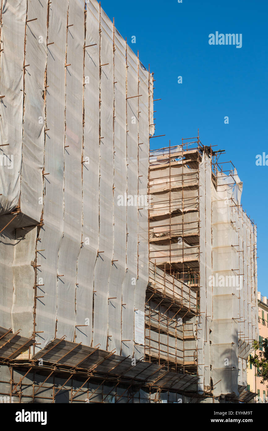 covered scaffold used in restoring building facade Stock Photo - Alamy