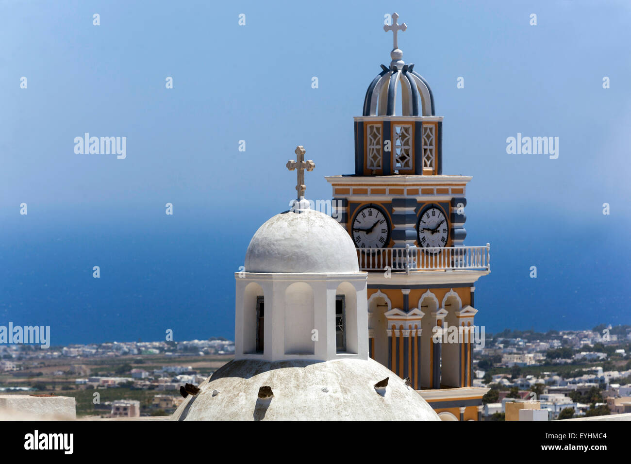 Orthodox church and Catholic cathedral tower Fira Santorini, Greek ...