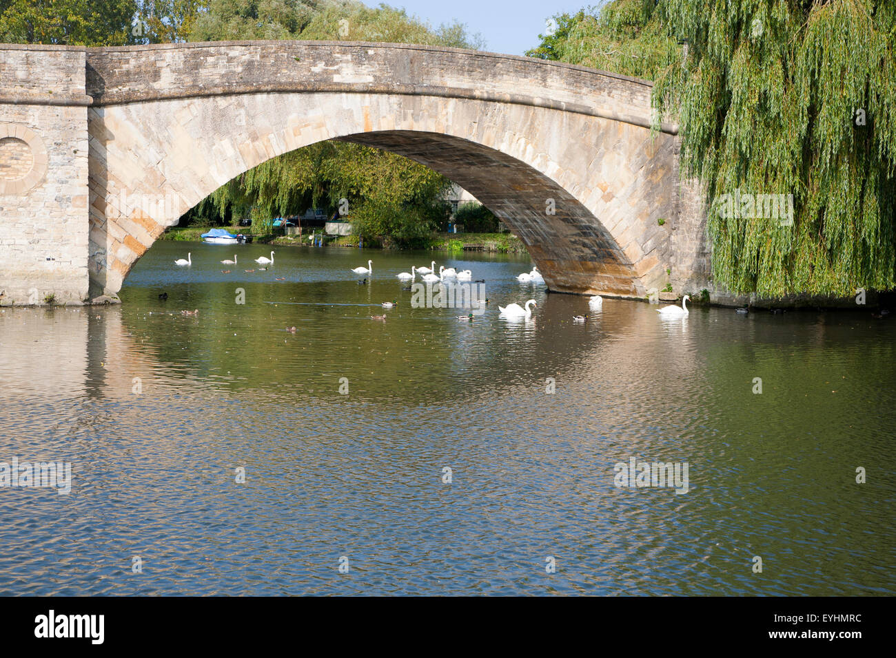 Historic stone bridge crossing River Thames at Lechlade on Thames ...