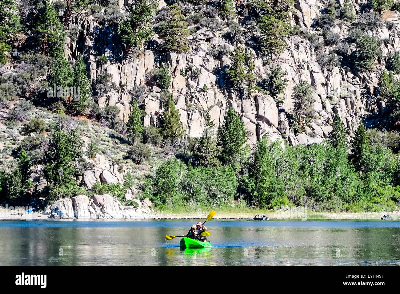 A mother and son Kayaking on June lake in June Lake California Stock ...