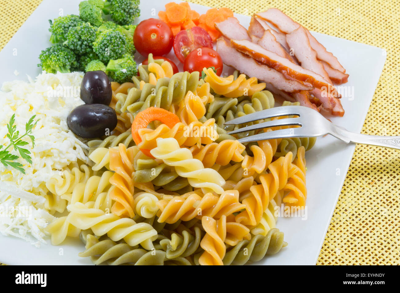 Plate of pasta on coloured plate hi-res stock photography and images ...