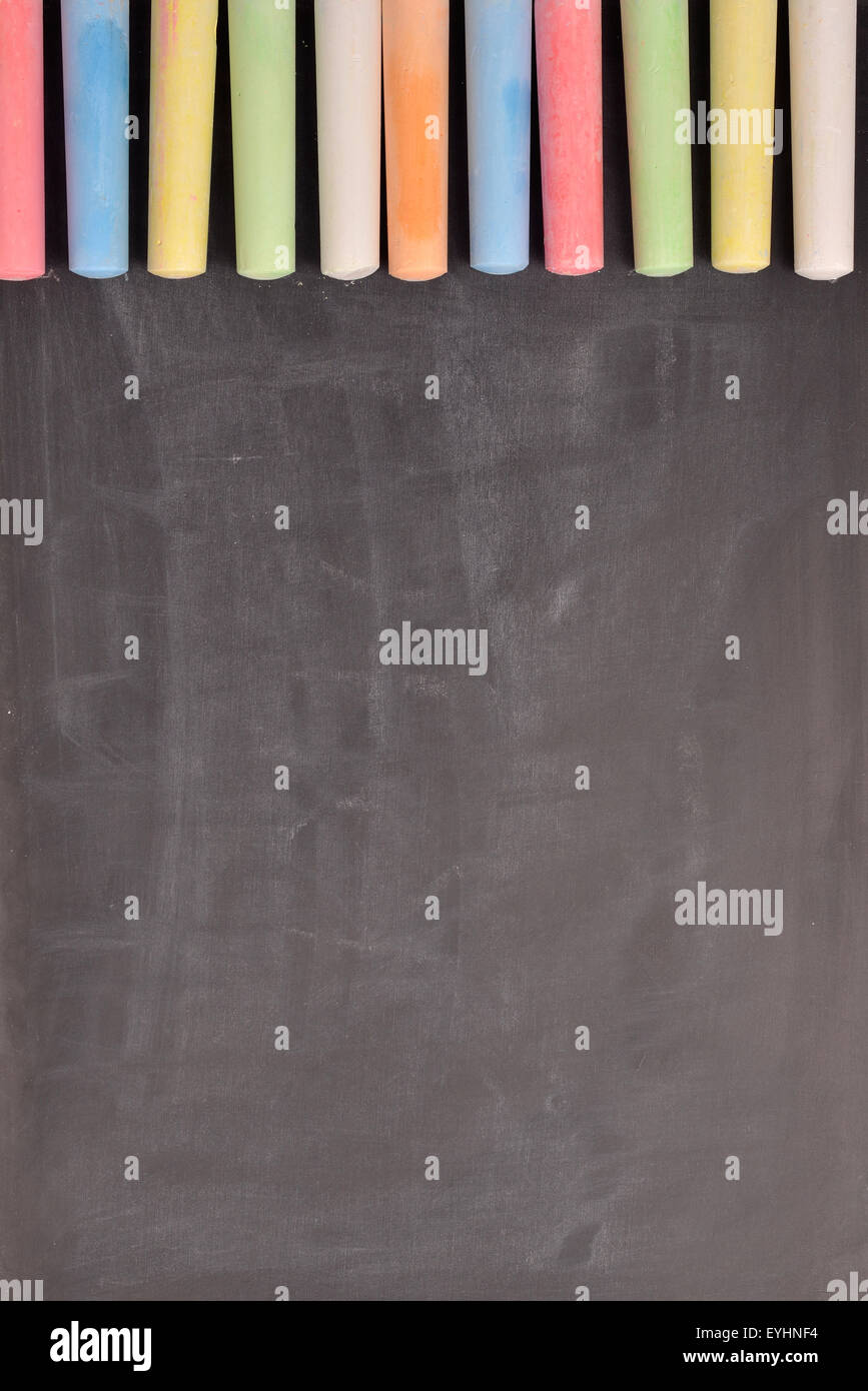 Colorful chalk on a blackboard with space for text or image Stock Photo ...