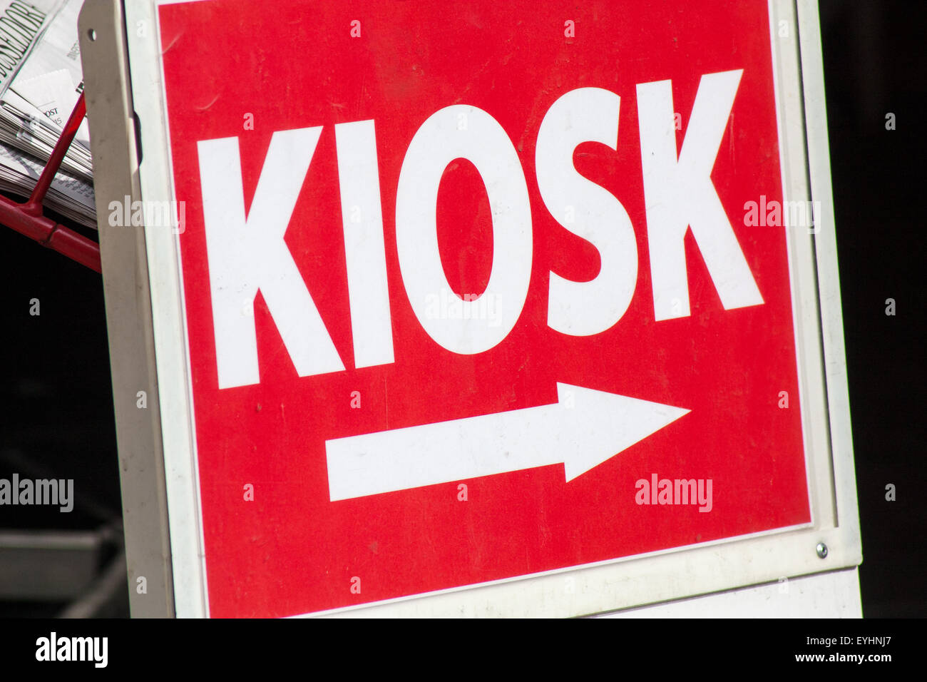 Kiosk sign pointing to the right Stock Photo - Alamy