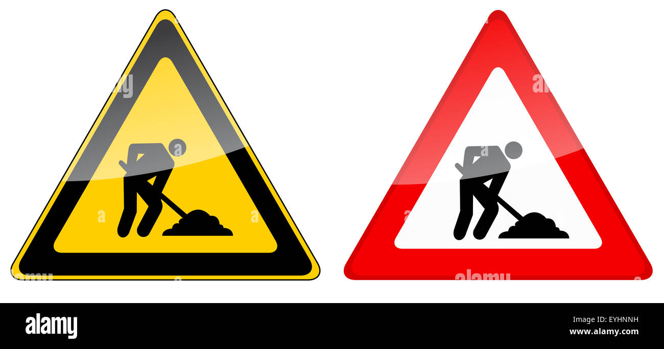 Two under construction sign, one red and one yellow Stock Photo - Alamy