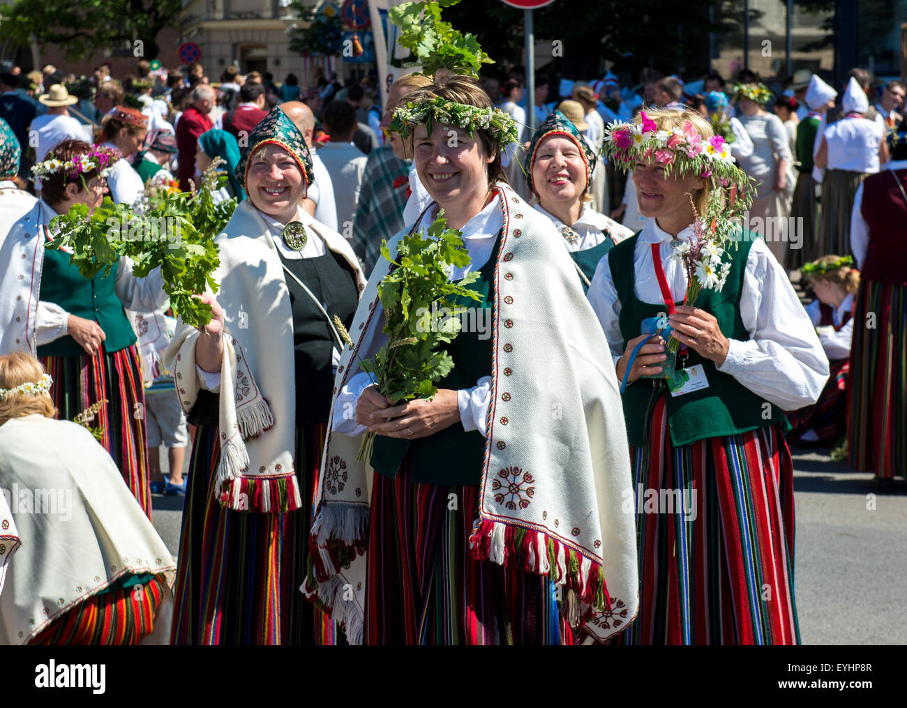 People in national costumes at the Latvian National Song and Dance ...