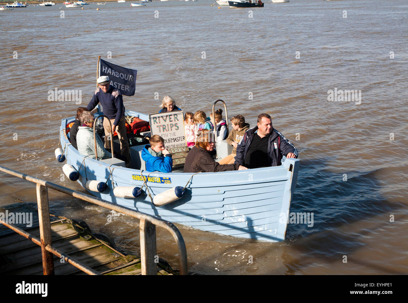 Small ferry boat crossing River Deben between Bawdsey Quay and ...