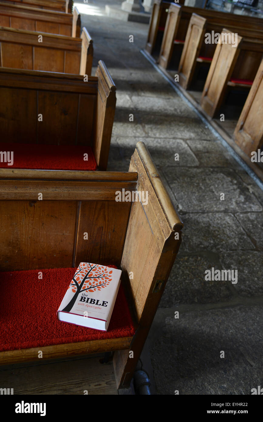 Bible on a church bench Stock Photo - Alamy