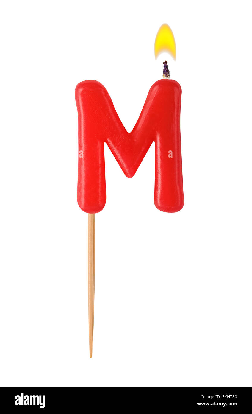 Burning candles in the form of the letter M Stock Photo - Alamy