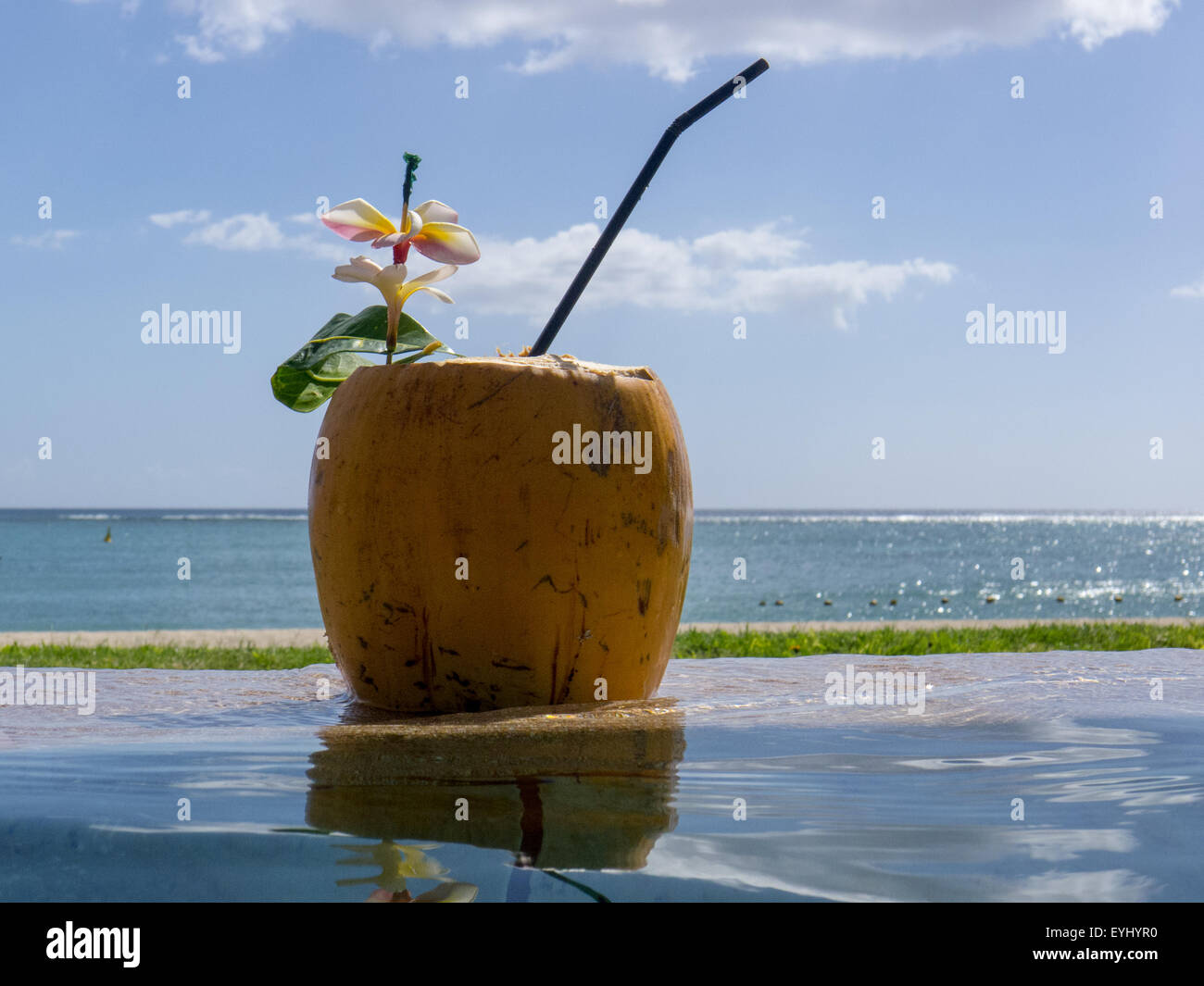 Flic en Flac, Mauritius. La Pirogue tourist resort. Coconut cocktail in ...