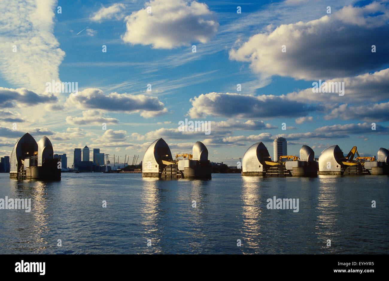 The Thames Barrier, looking west towards Canary Wharf, London UK Stock ...