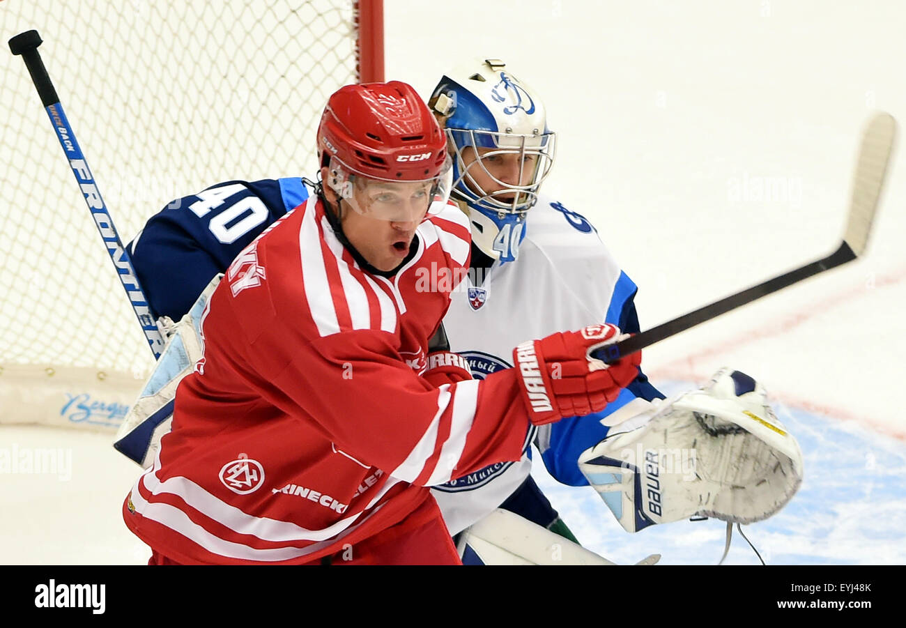 From left Jiri Polansky of Trinec and goalkeeper Dmitriy Milchakov of ...
