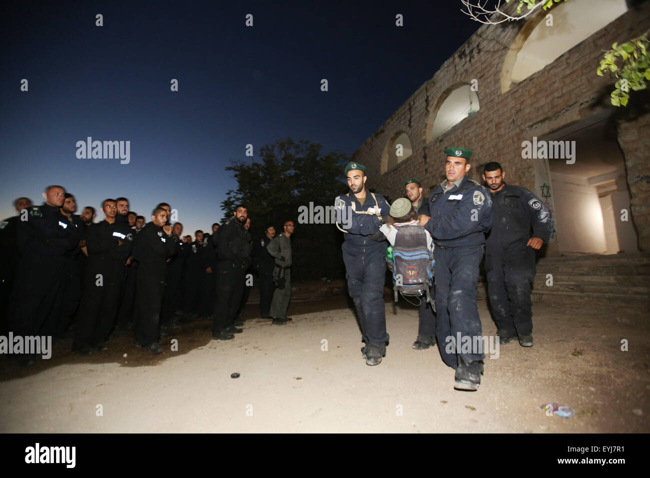Jerusalem. 30th July, 2015. Israeli security forces evacuate a Jewish ...
