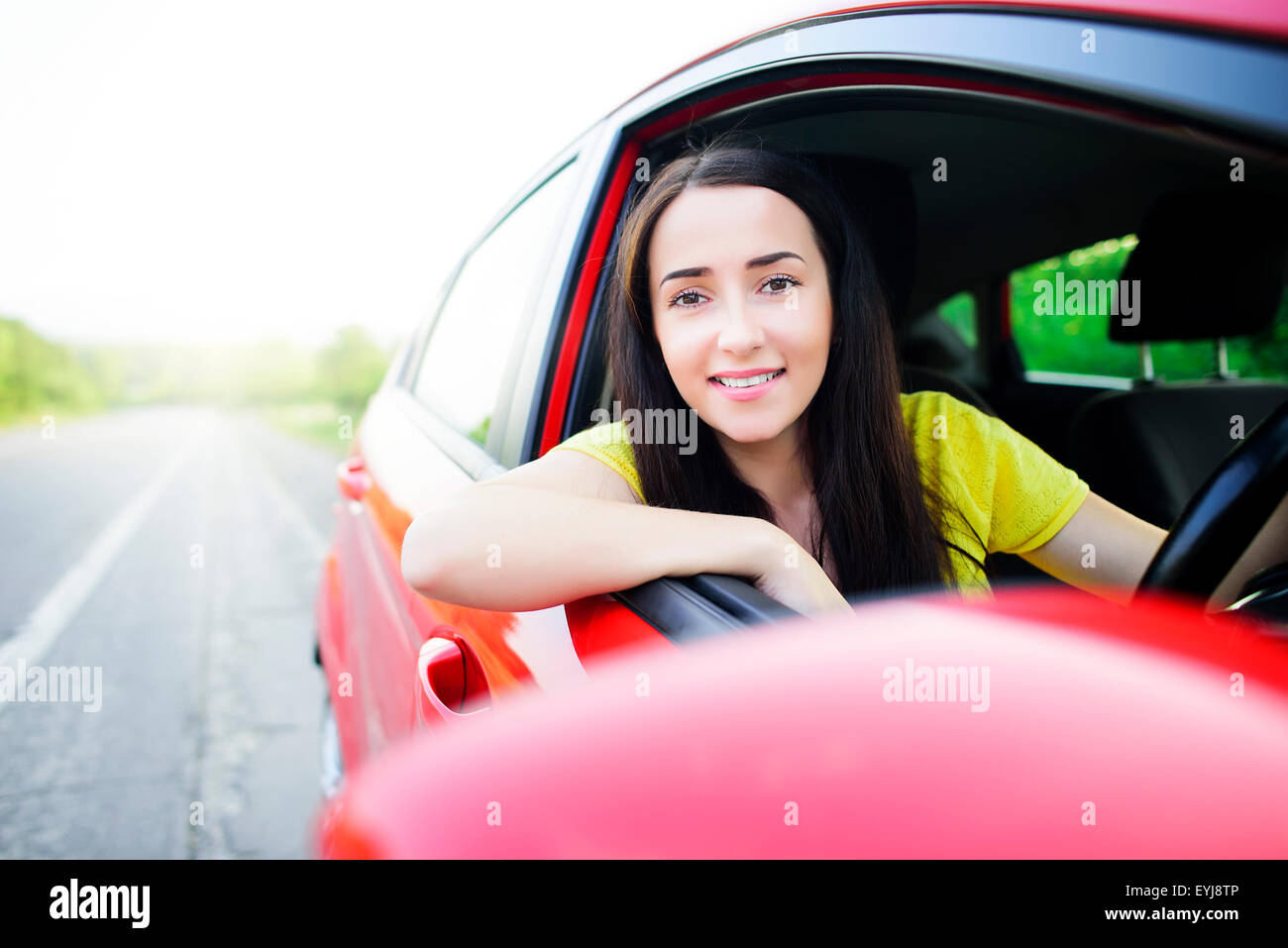 Beautiful woman in a car Stock Photo - Alamy
