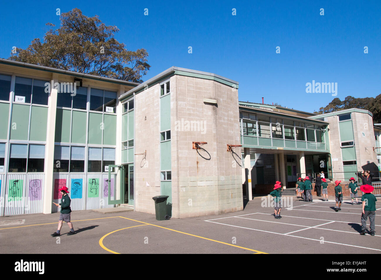 School children playing games in their primary school playground,Sydney ...