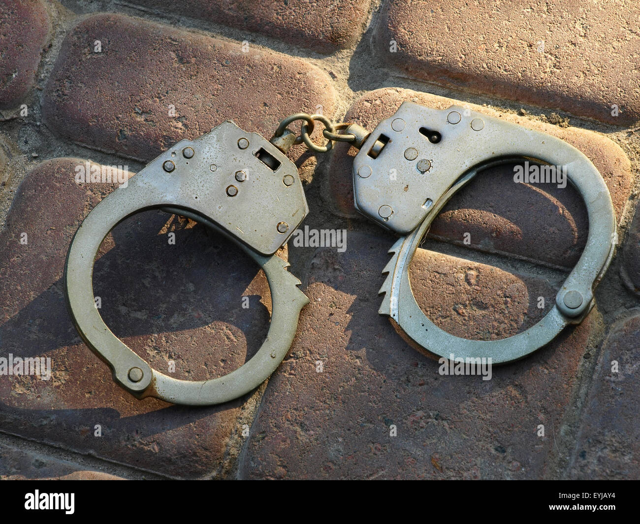 A pair of handcuffs hi-res stock photography and images - Alamy