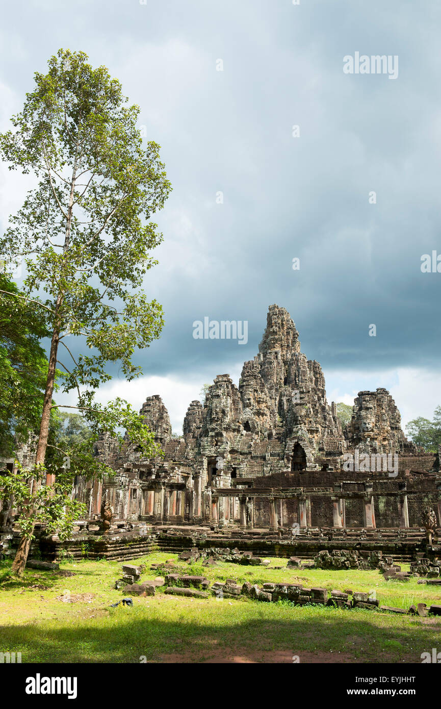 Angkor Temple of Bayon with surrounding greenery in the Angkor Thom ...