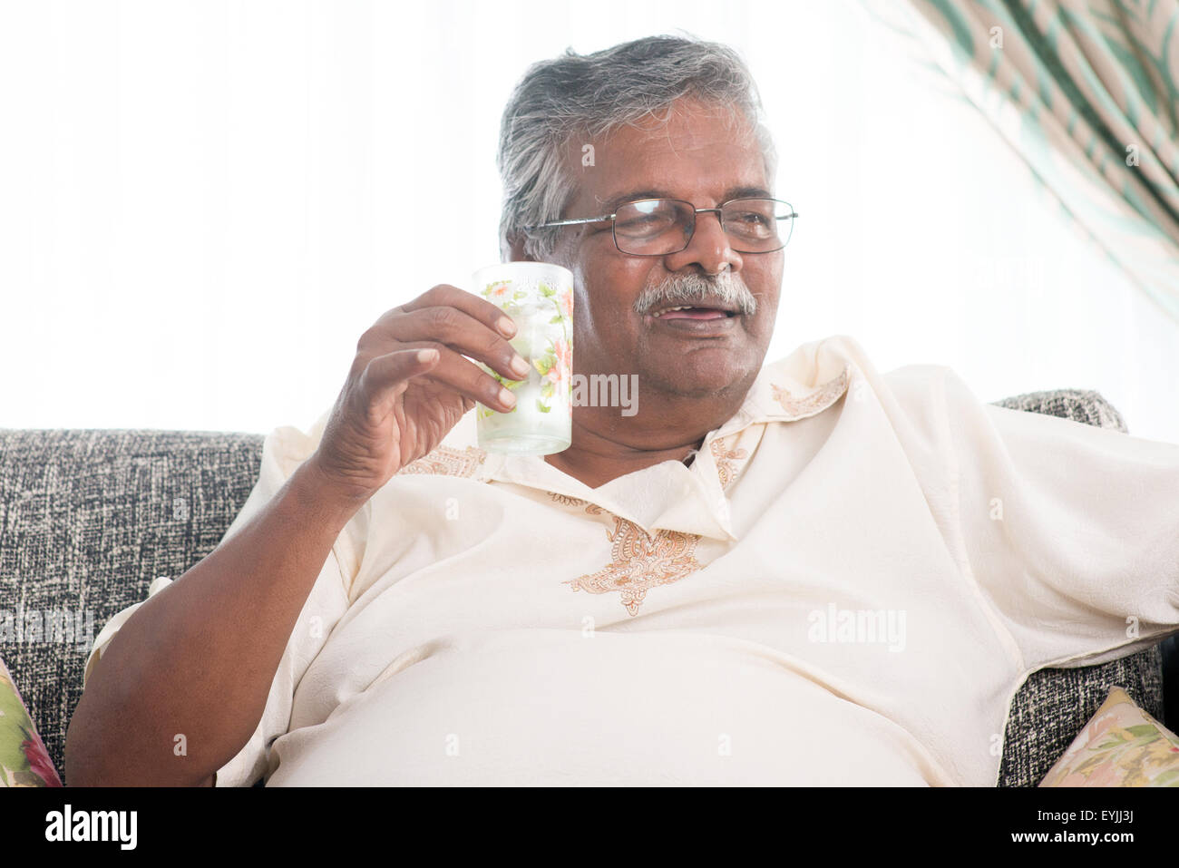 Old man drinking water care home hi-res stock photography and images ...