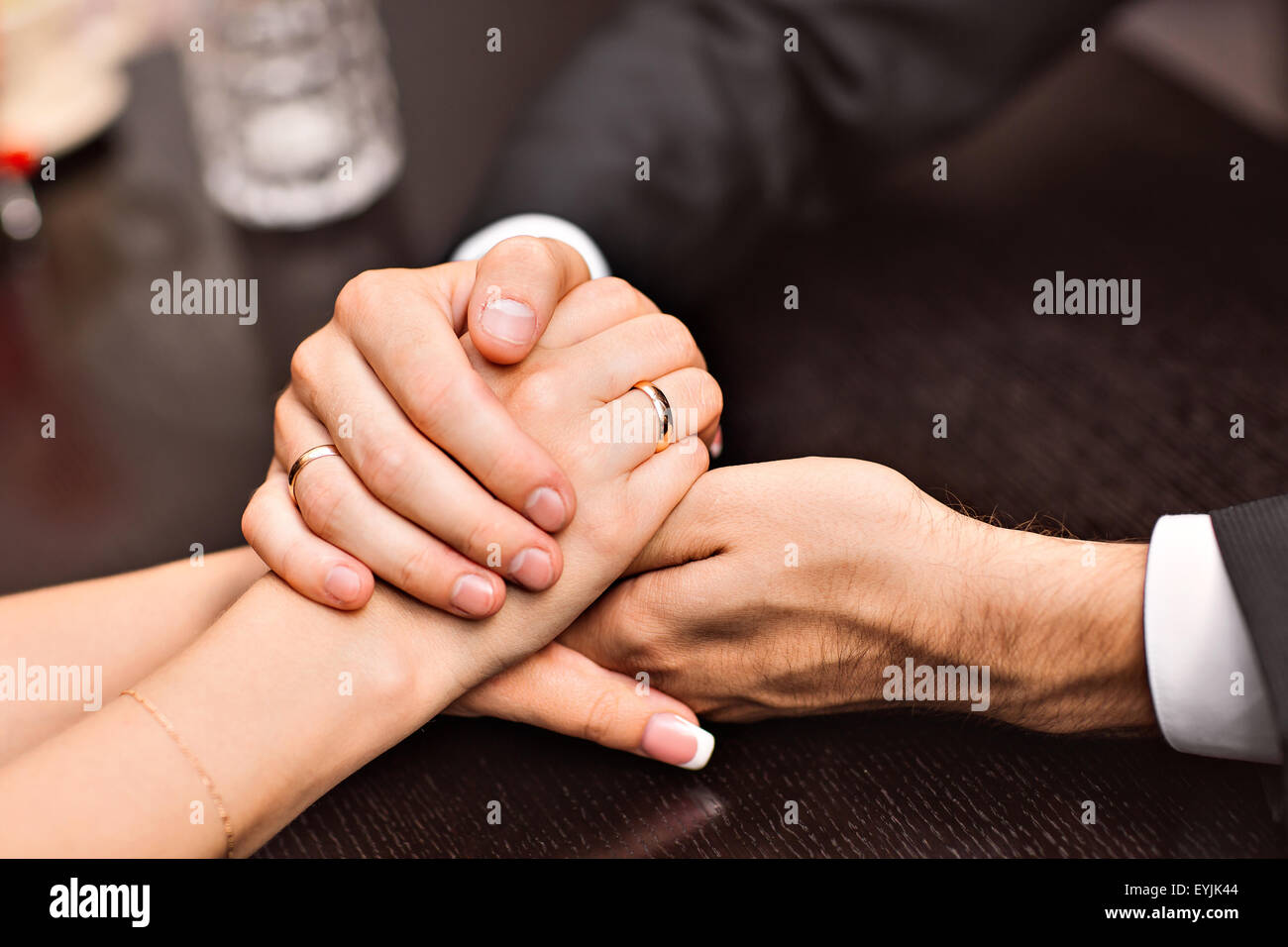 Lovers couple holding hands Stock Photo - Alamy