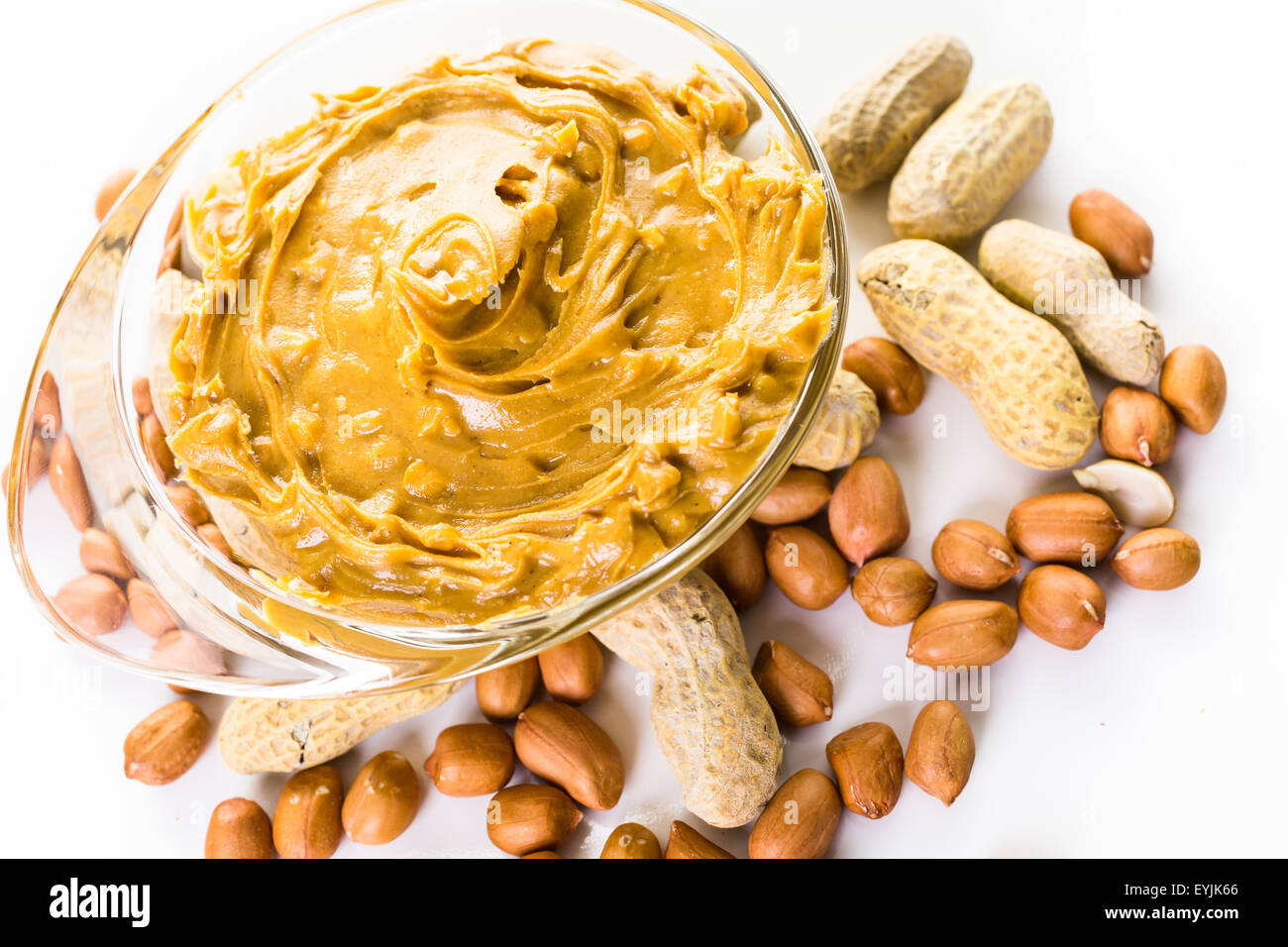 Extra chunky peanut butter on a white background Stock Photo - Alamy