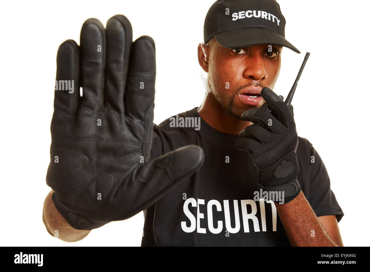 Man from security firm talking into radio set and keeping distance with ...