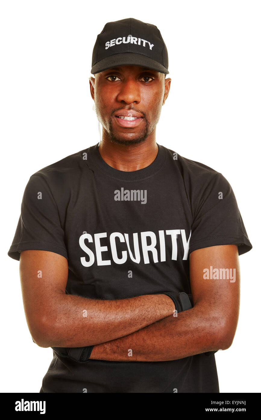 Smiling black man as security guard with his arms crossed Stock Photo ...