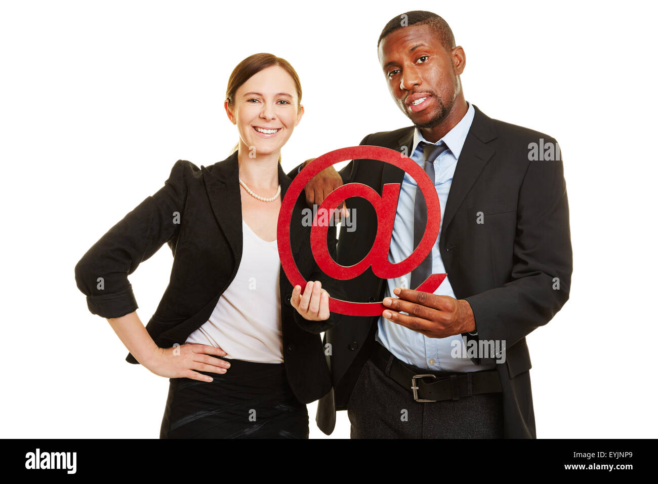 Business people holding a red at-sign as email symbol Stock Photo - Alamy