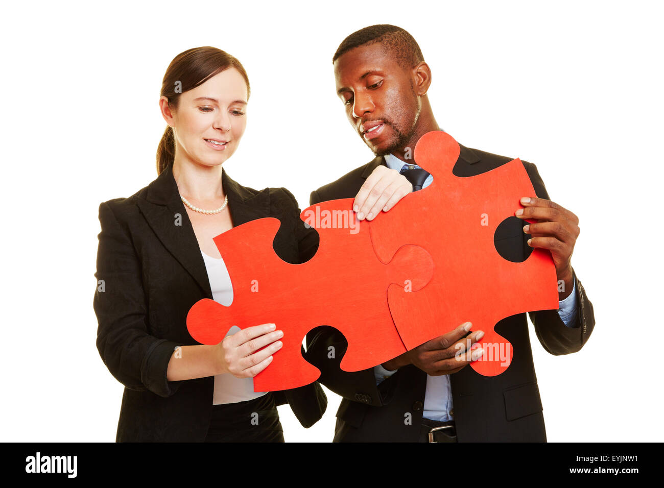 Business people connecting puzzle pieces hi-res stock photography and ...