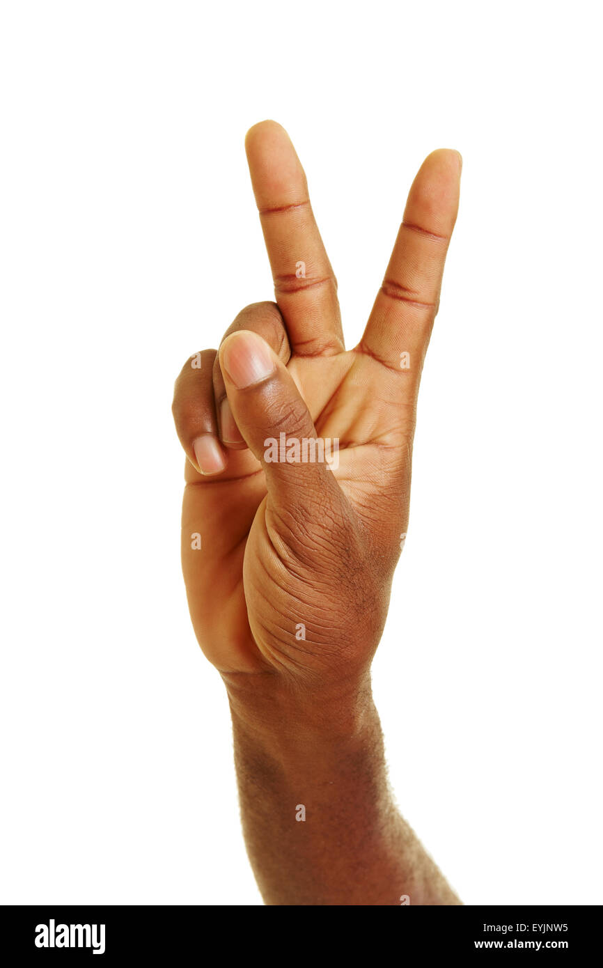 African man showing victory sign with his hand Stock Photo - Alamy