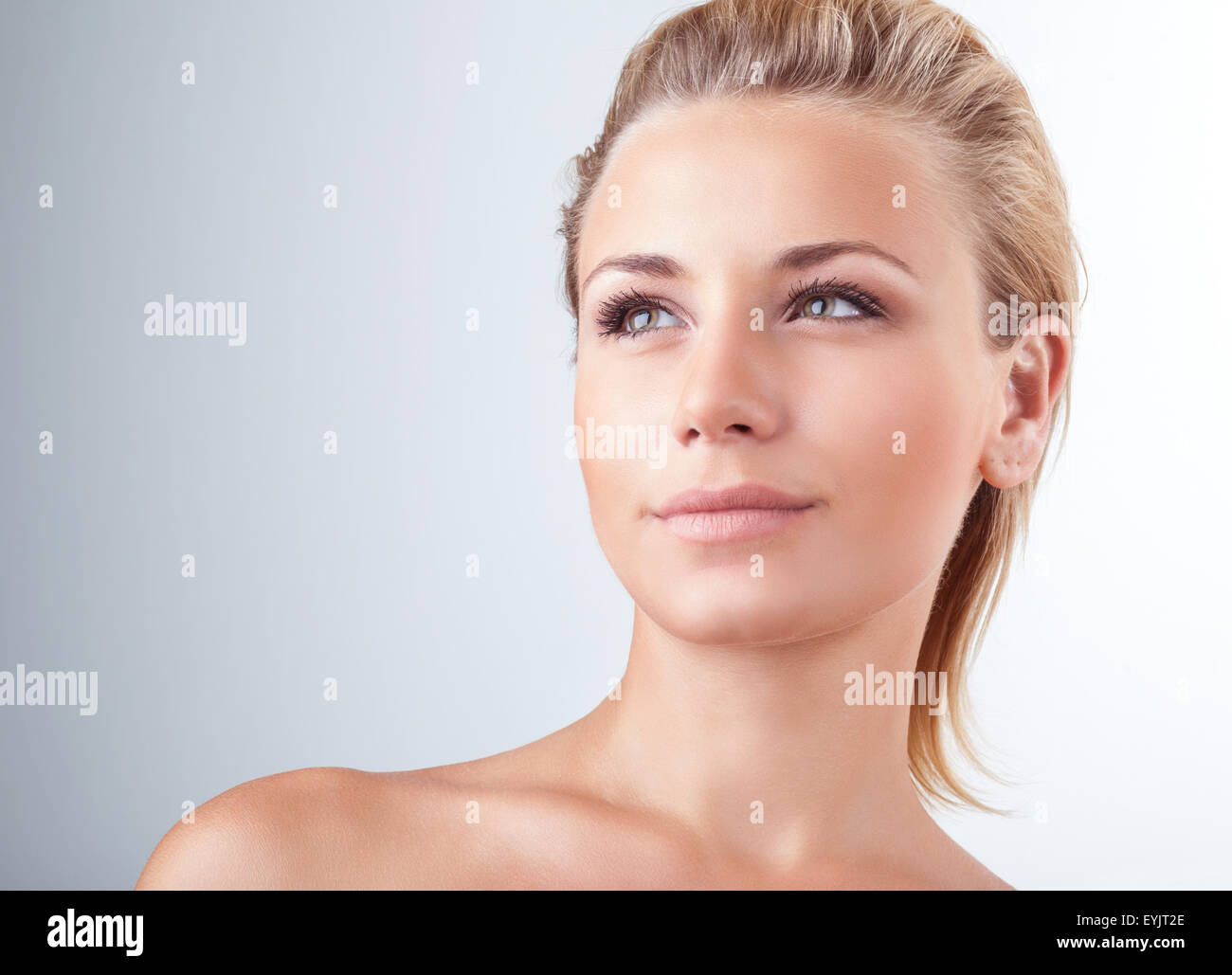 Closeup Portrait Of Beautiful Gentle Blond Woman With Natural Makeup