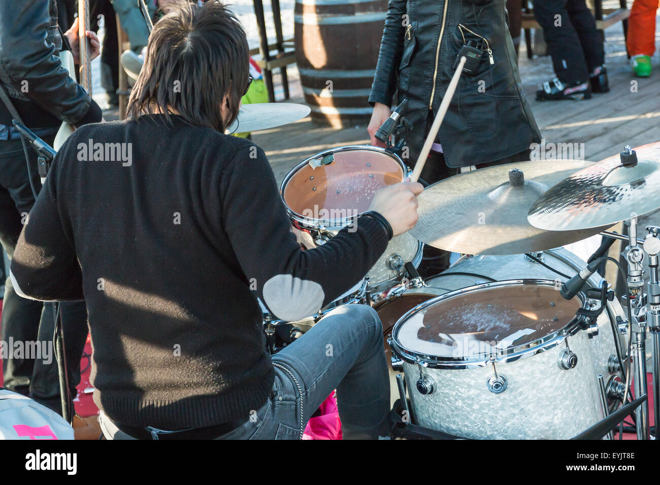 black hair drummer during outdoor concert: rear view Stock Photo - Alamy